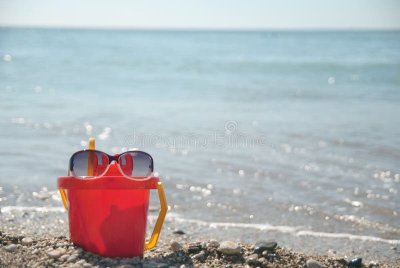 Red bucket stock image. Image of suncream, fruit, beach - 26573547