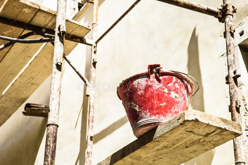 Red bucket stock photo. Image of scaffolding, sunlight - 29547586