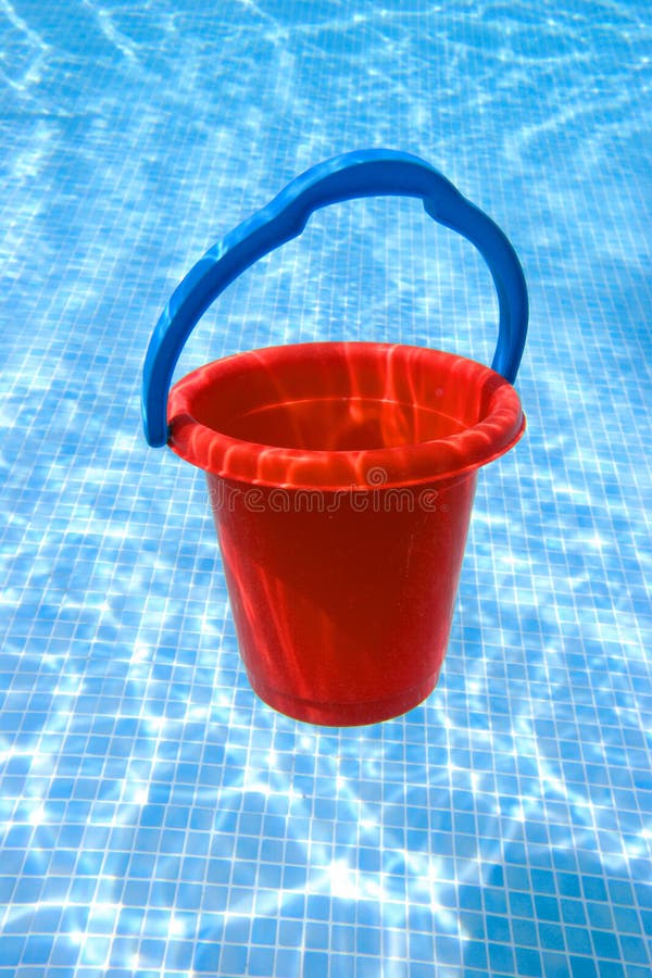 Red Bucket and Blue Spade on Sunny, Sandy Beach Stock Photo - Image of ...
