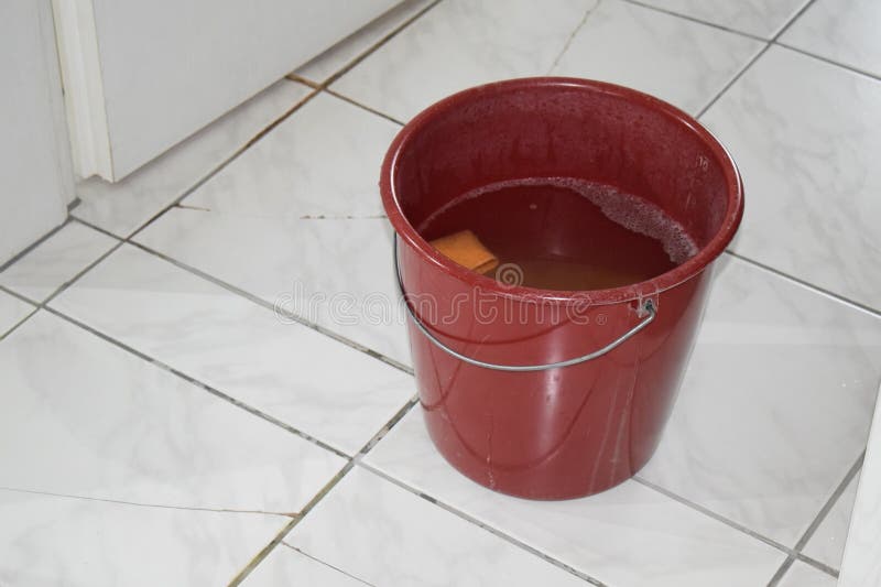 Red bucket with water stock photo. Image of lighting - 361408892