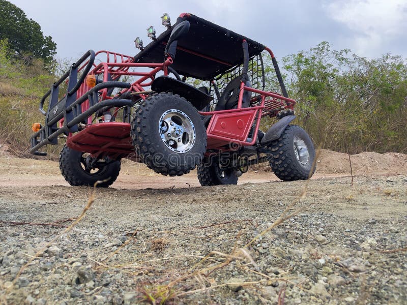 Red Buggy Car on a Rocky Road Stock Photo - Image of outdoors ...