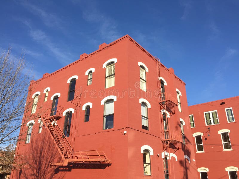 Red building background stock image. Image of floors - 83563909