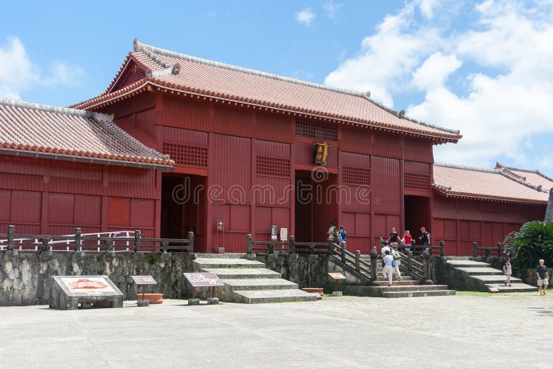 Red Building in Naha, Japan Under Blue Sky and White Clouds Editorial ...