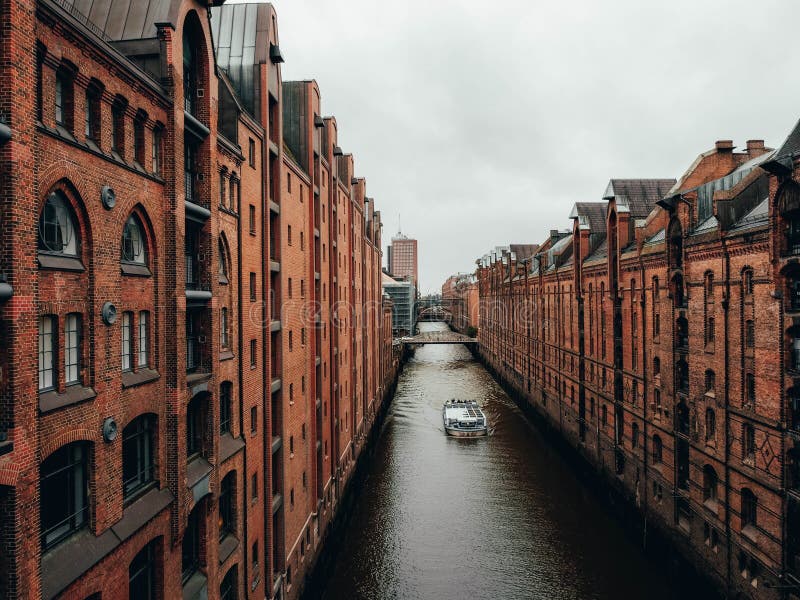 Red buildings on the river stock photo. Image of neighbourhood - 234236624