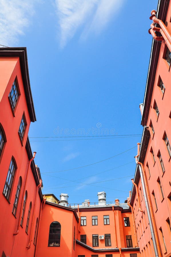 Red buildings under sky stock image. Image of bright - 36737269