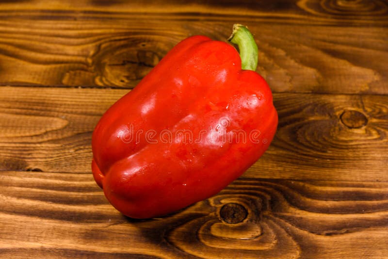 Red Bulgarian Pepper on a Wooden Table Stock Image - Image of ...
