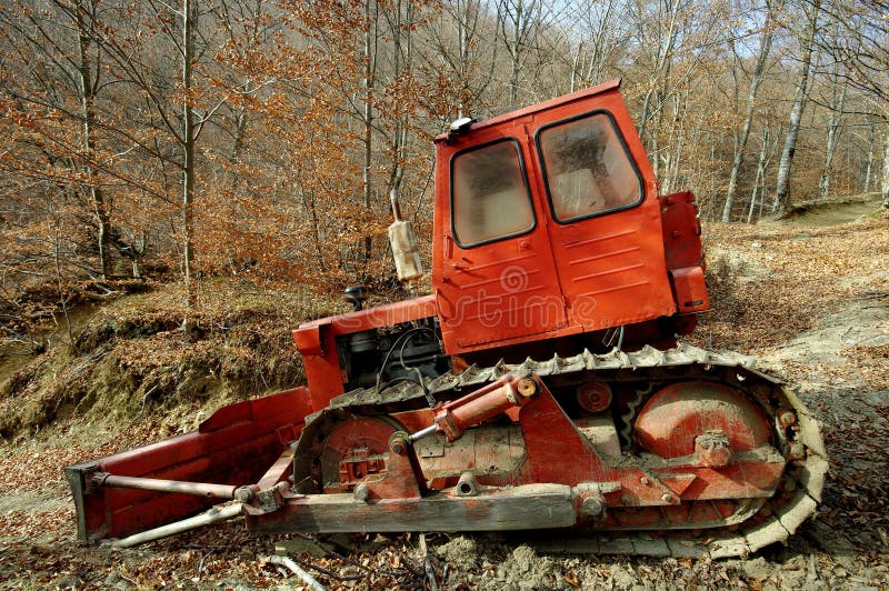 Red Bulldozer in the Forest Stock Photo - Image of heavy, dirt: 41277404