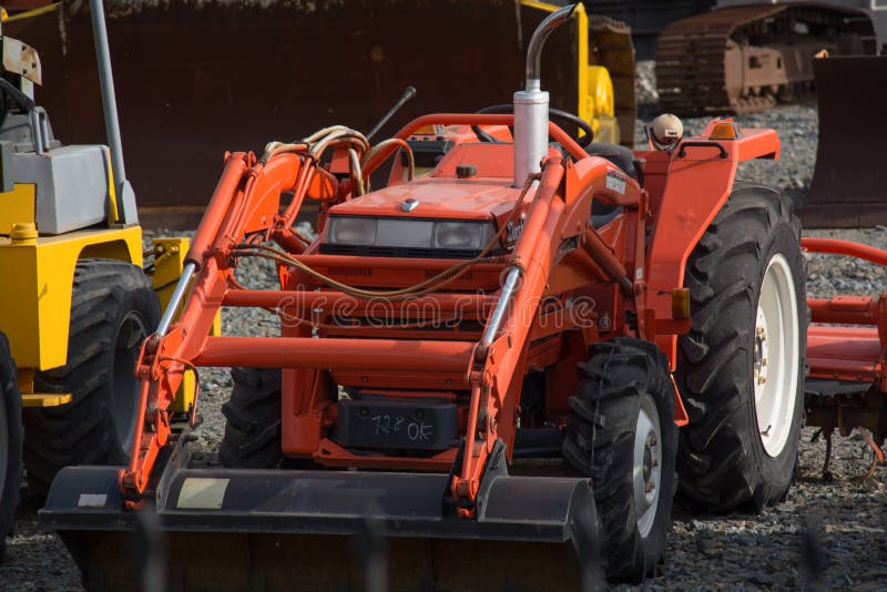 Red Bulldozer at a Parking Lot Stock Image - Image of eathmoving ...