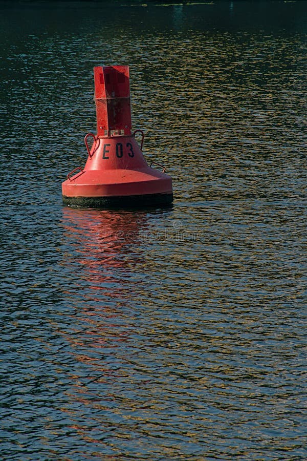 Red Buoy in the Water of a River Editorial Image - Image of marker ...