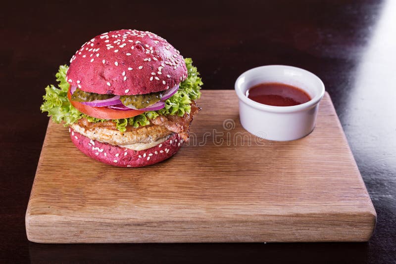 Red burger on the board stock photo. Image of fastfood - 104205602