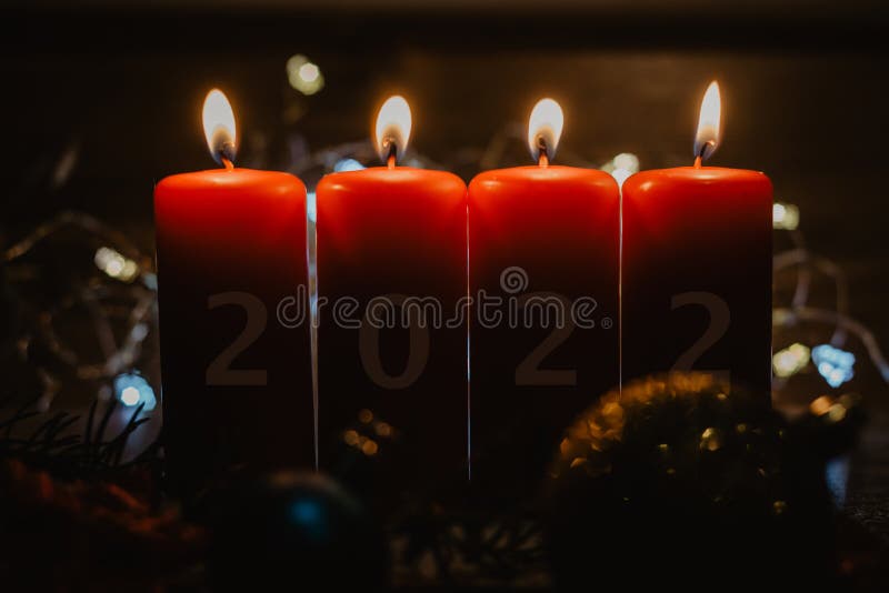 Red Burning Advent Candles with 202 Text and Christmas Decorations ...