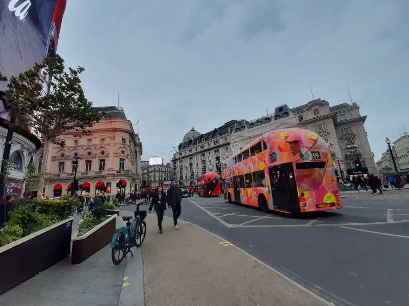 Red Bus Along Piccadilly Circus in London,UK Editorial Photography ...