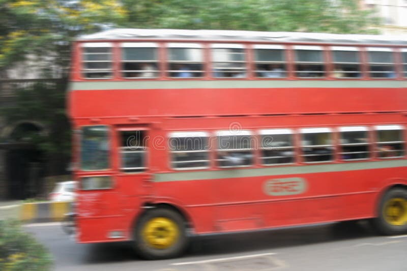 Red Bus Coming Down the Road. Blurred Stock Image - Image of symbol ...