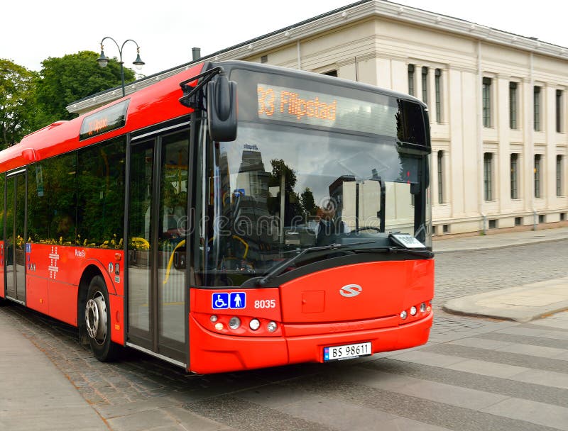 Red Bus Driving Down Street. Oslo, Norway Editorial Photo - Image of ...