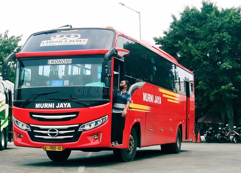 Red bus editorial photo. Image of vehicle, jakarta, passenger - 223672016