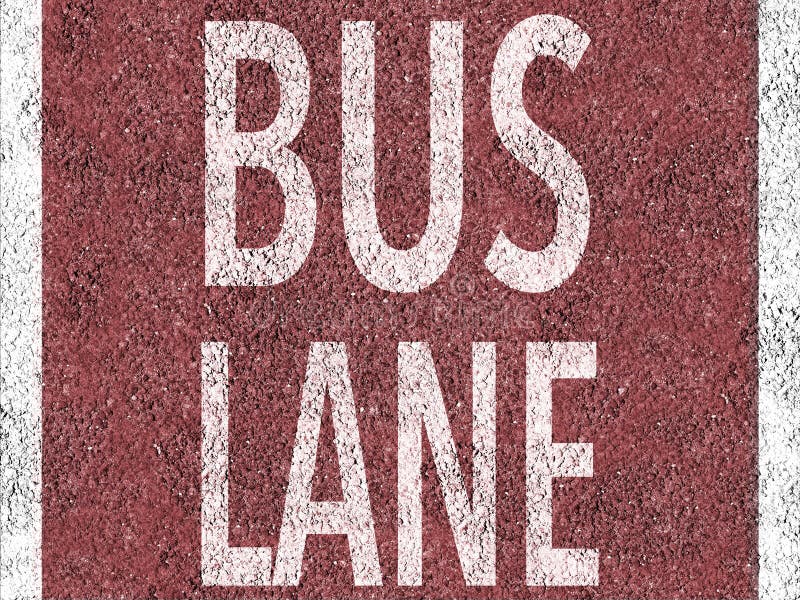 Red bus lane on asphalt stock image. Image of street - 56645329