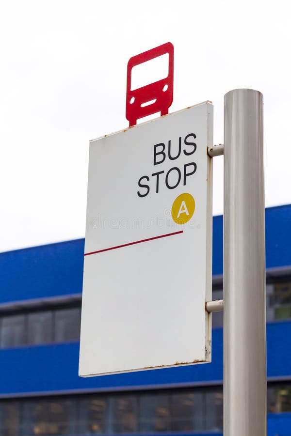 Red Bus Shape on Bus Stop Sign Stock Photo - Image of traffic, outdoor ...