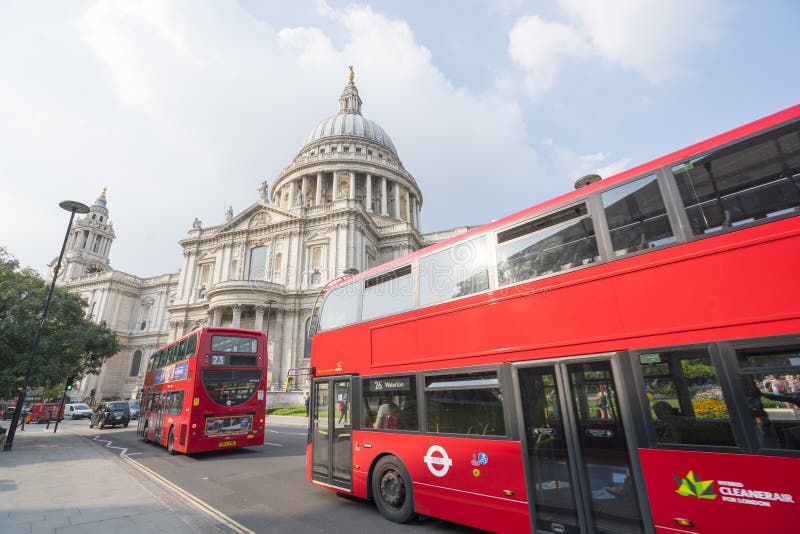 Red Buses in the Streets London - Typical Street View - LONDON, ENGLAND ...