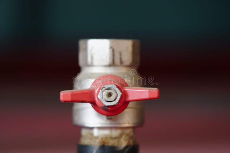 Red butterfly handle valve stock image. Image of natural - 266186855