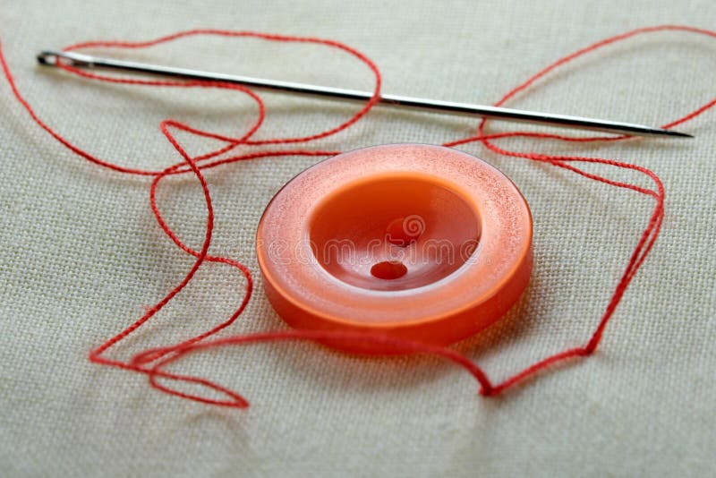 Red button with a needle stock photo. Image of handmade - 236208860