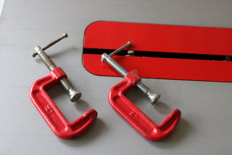 F Clamp with Red Handle on Table Saw Stock Image - Image of joiner ...