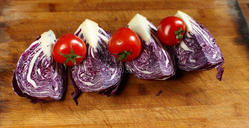Red Cabbage Slices and Red Cherry Tomatoes Stock Photo - Image of ...