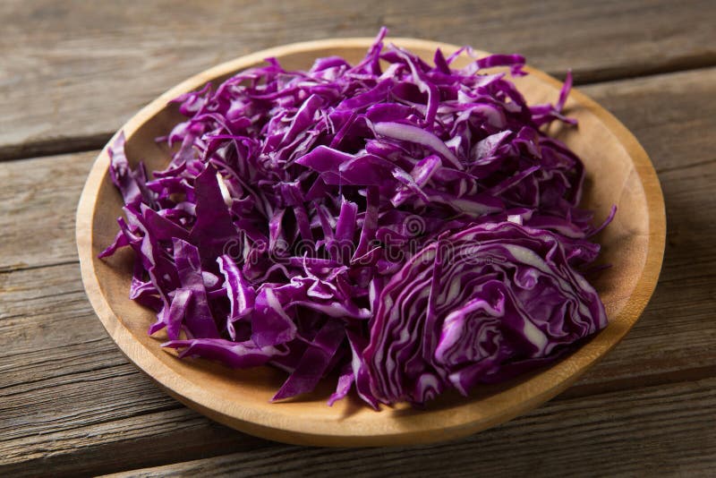 Red Cabbage in Wooden Plate Stock Photo - Image of wood, table: 99476802