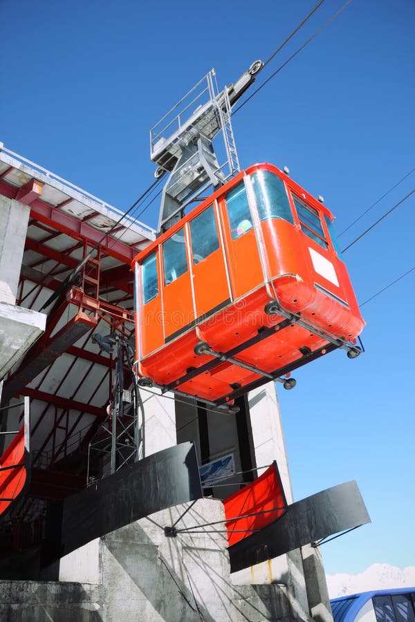 Red cableway stock photo. Image of tourism, cableway - 18870080