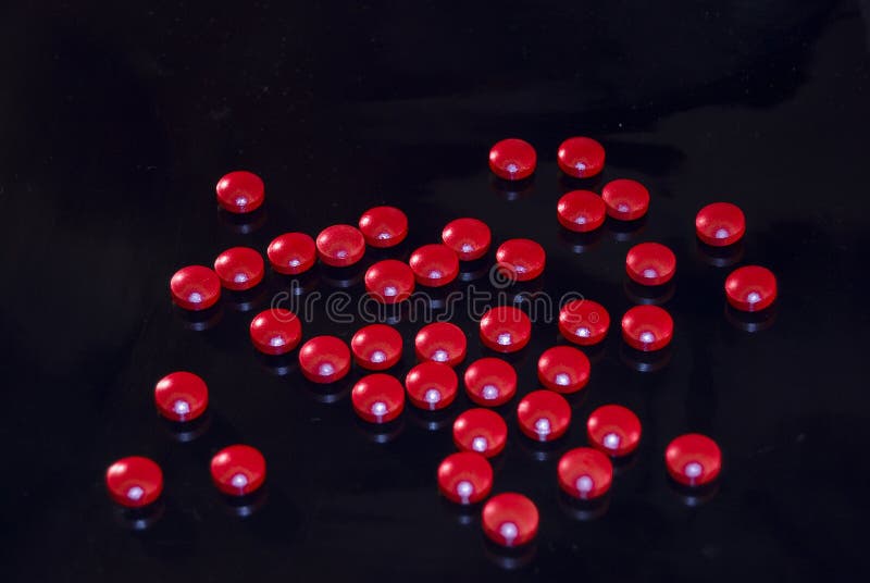 Red caffeine Pills stock photo. Image of caffeine, bright - 7048372