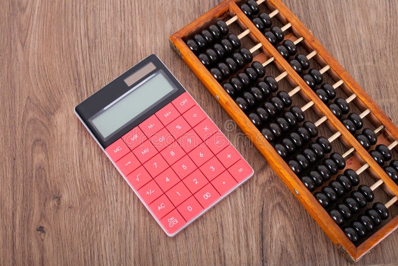 A Red Calculator and a Abacus Stock Image - Image of tool, item: 197204171