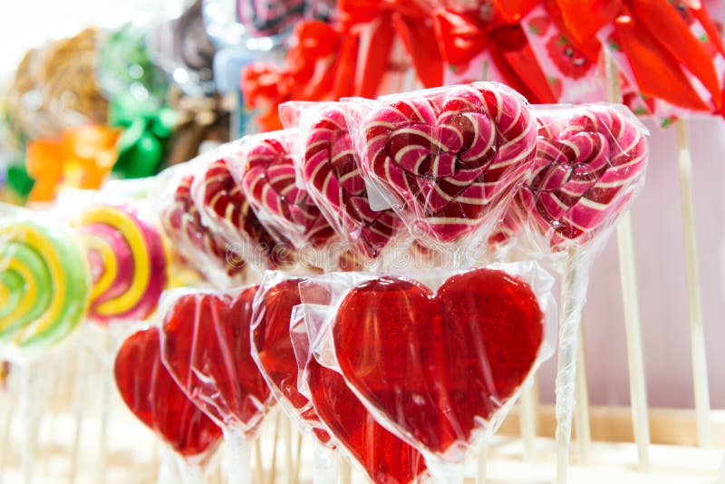Red Candies are Arranged in Even Rows on a Shop Window. Stock Image ...