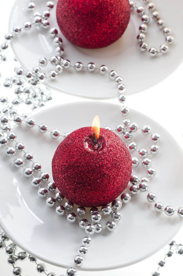 The red candle stock photo. Image of pearl, plate, flame - 21666238