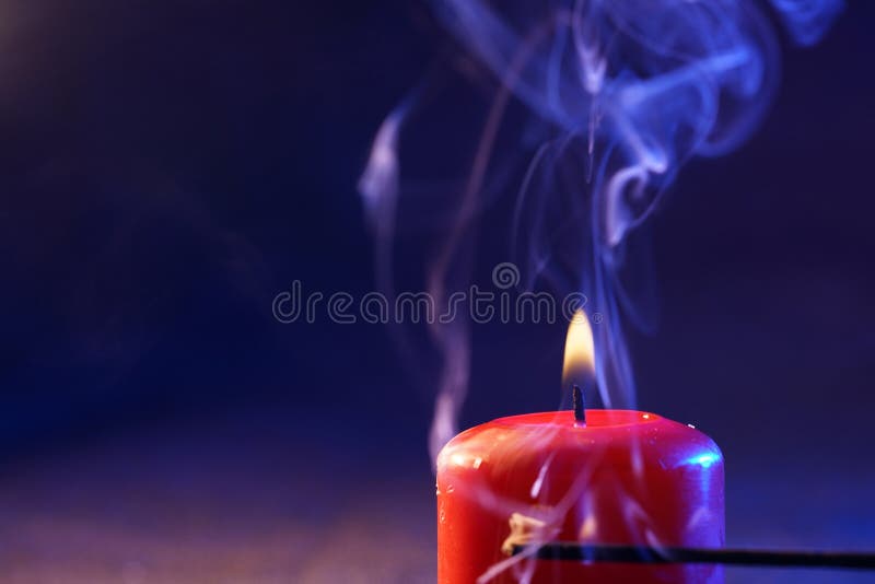 Red Candle with Smoke and Flame Photographed in the Studio with Color ...