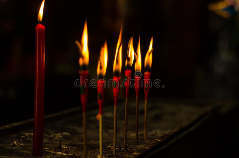 Red candlelight stock image. Image of buddhist, smoke - 75410553