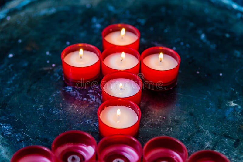Red Candles Arranged in a Cross Stock Image - Image of burning ...