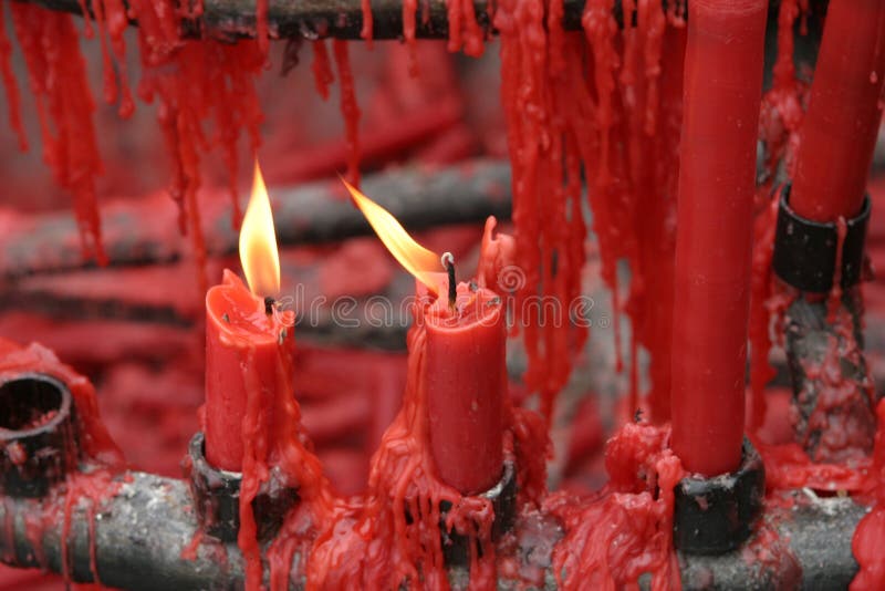 Red Candles Burning in a Buddhist Shrine Stock Photo - Image of flame ...