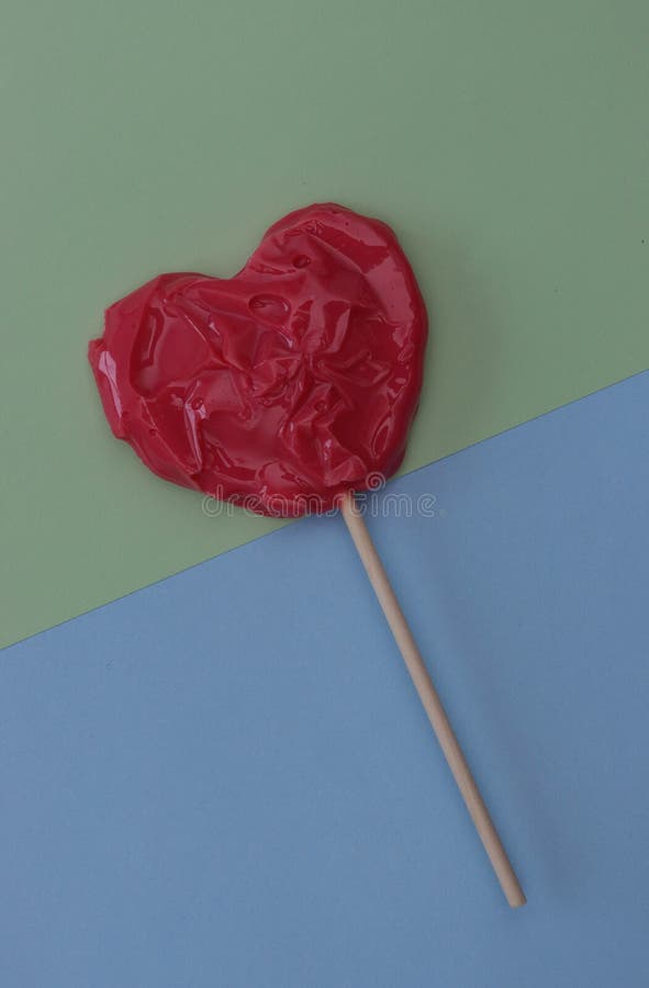 Red Candy on a Stick in the Form of a Heart on a Stick. Stock Image ...