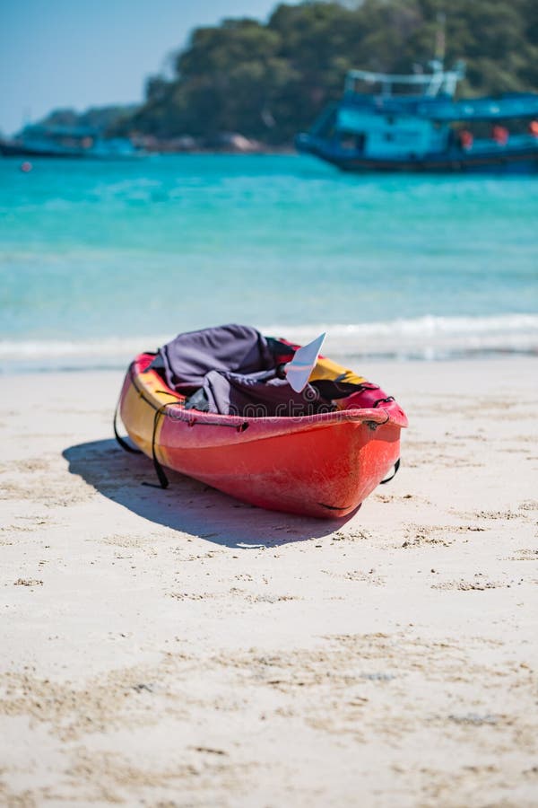 Red canoe on a beach stock image. Image of boat, colorful - 141664265