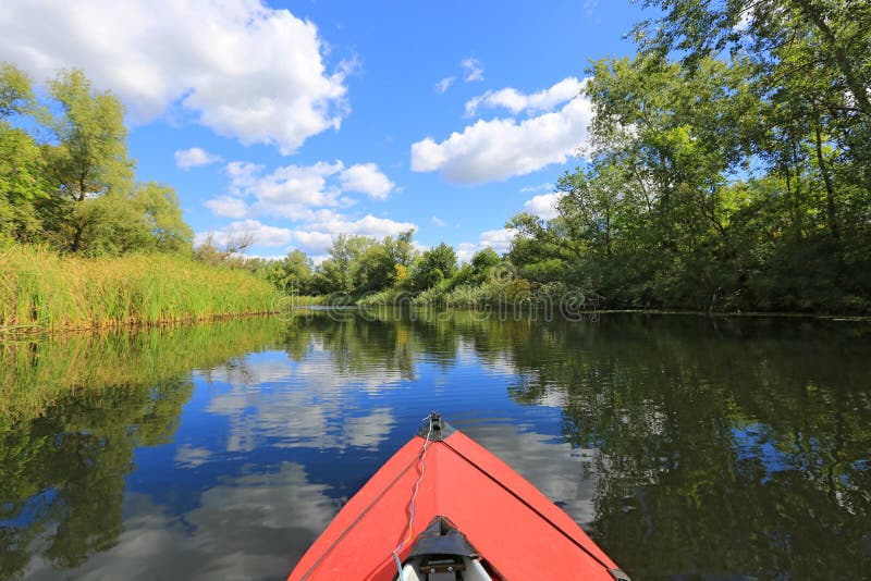 Red canoe in nice river stock image. Image of river - 229262823