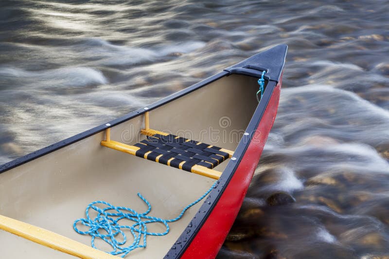 Red Canoe Stern with a Rope Stock Image - Image of river, water: 38235247