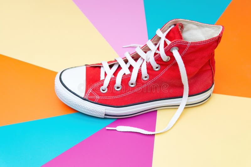 Red Canvas Trainer on Abstract Retro Background Stock Photo - Image of ...