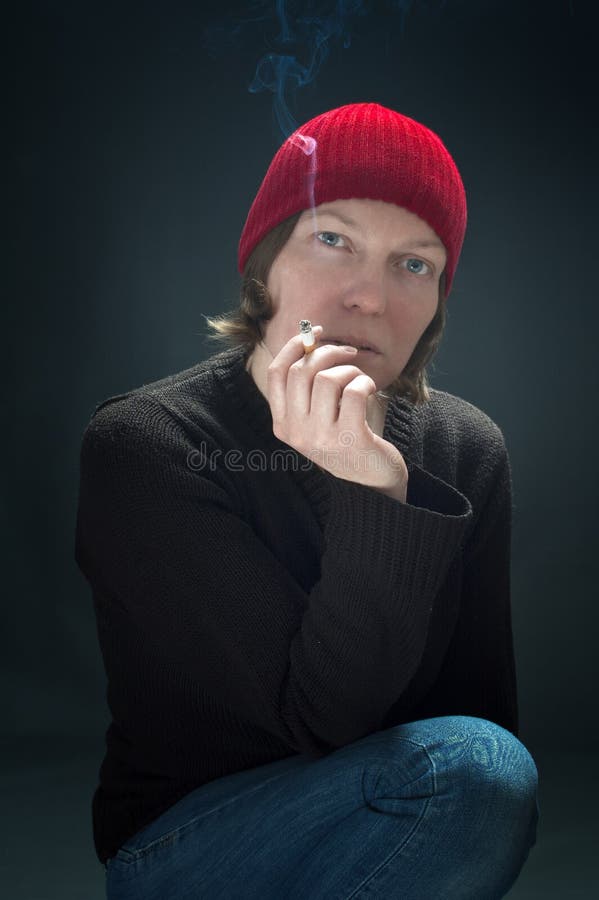 Red cap smoker stock image. Image of burn, enjoyment - 29226053