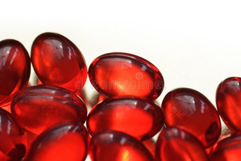 Red shiny gel pills stock image. Image of blue, healthy - 1531059