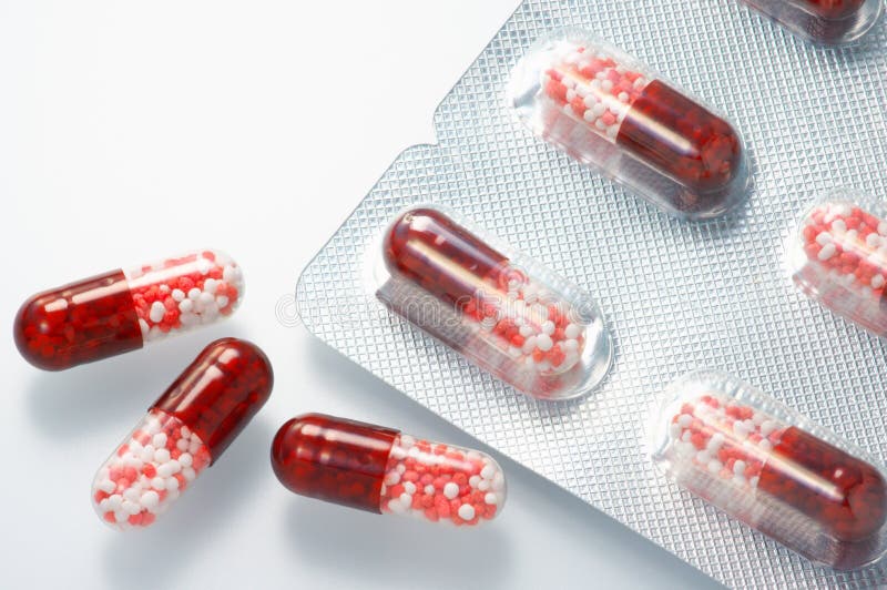 Red capsule medicines. stock photo. Image of medicament - 40005884
