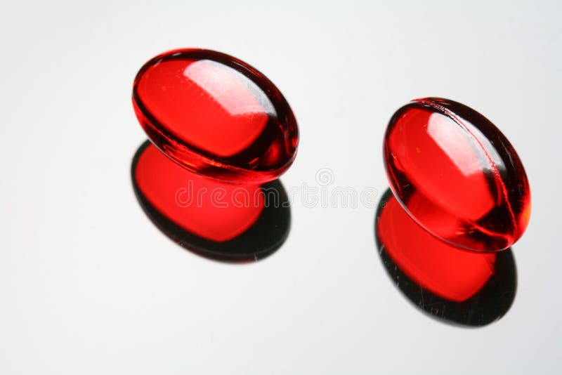 Red capsules stock photo. Image of nutritional, healthcare - 12569964