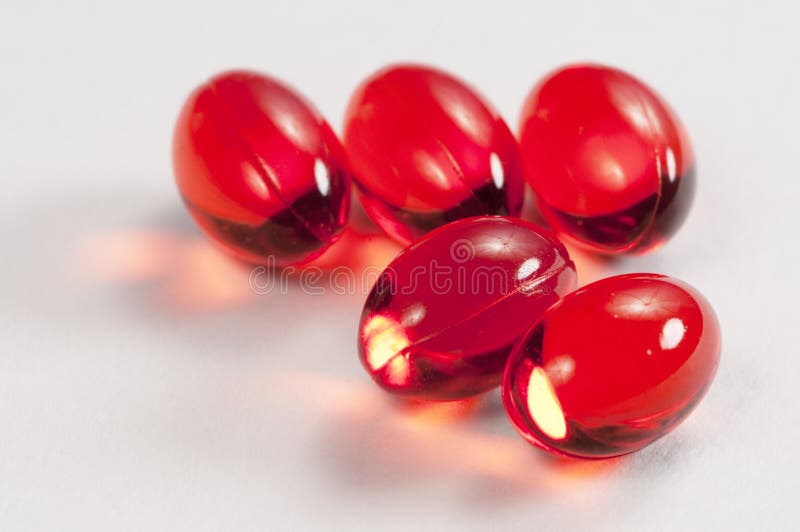 Red capsules stock image. Image of vitamin, gray, medicine - 39713209