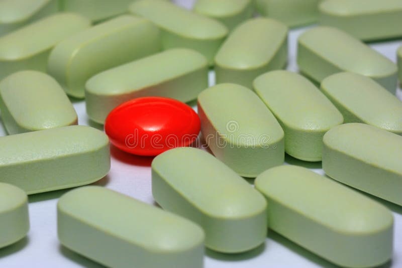 Red Capsules of Tablets of Different Colors Stock Image - Image of ...
