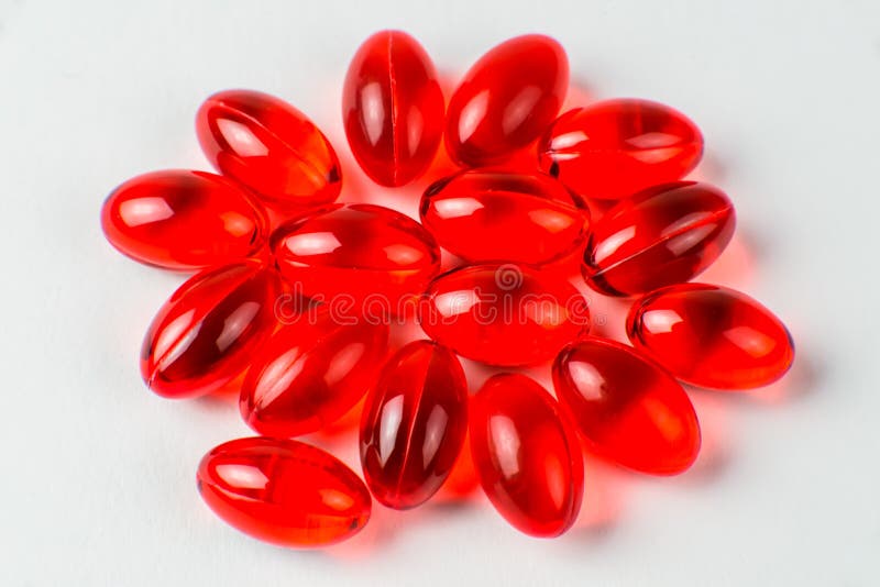 Red shiny gel pills stock image. Image of blue, healthy - 1531059