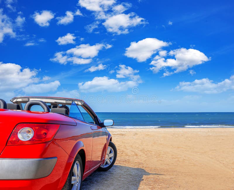 Red car on the beach. stock photo. Image of drive, american - 188074486