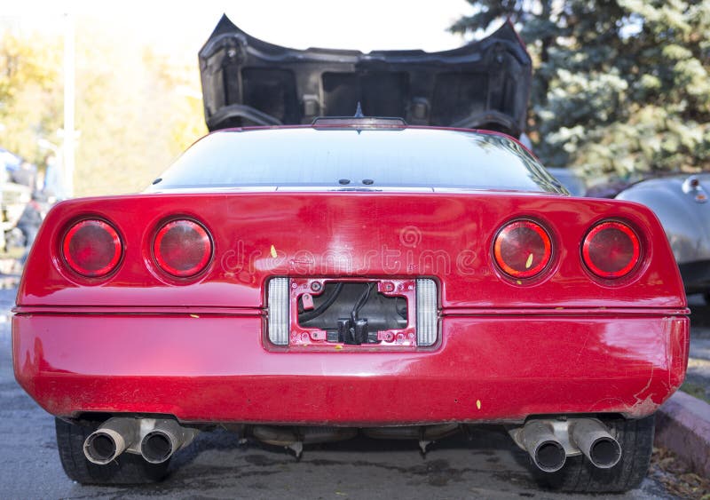 Red car behind - autumn stock image. Image of model, luxury - 36835089